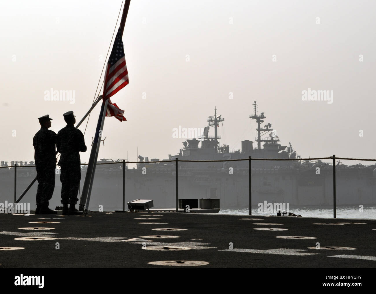 Airman Adam Pond, aviation boatswain's mate (fuel), left, and Seaman ...