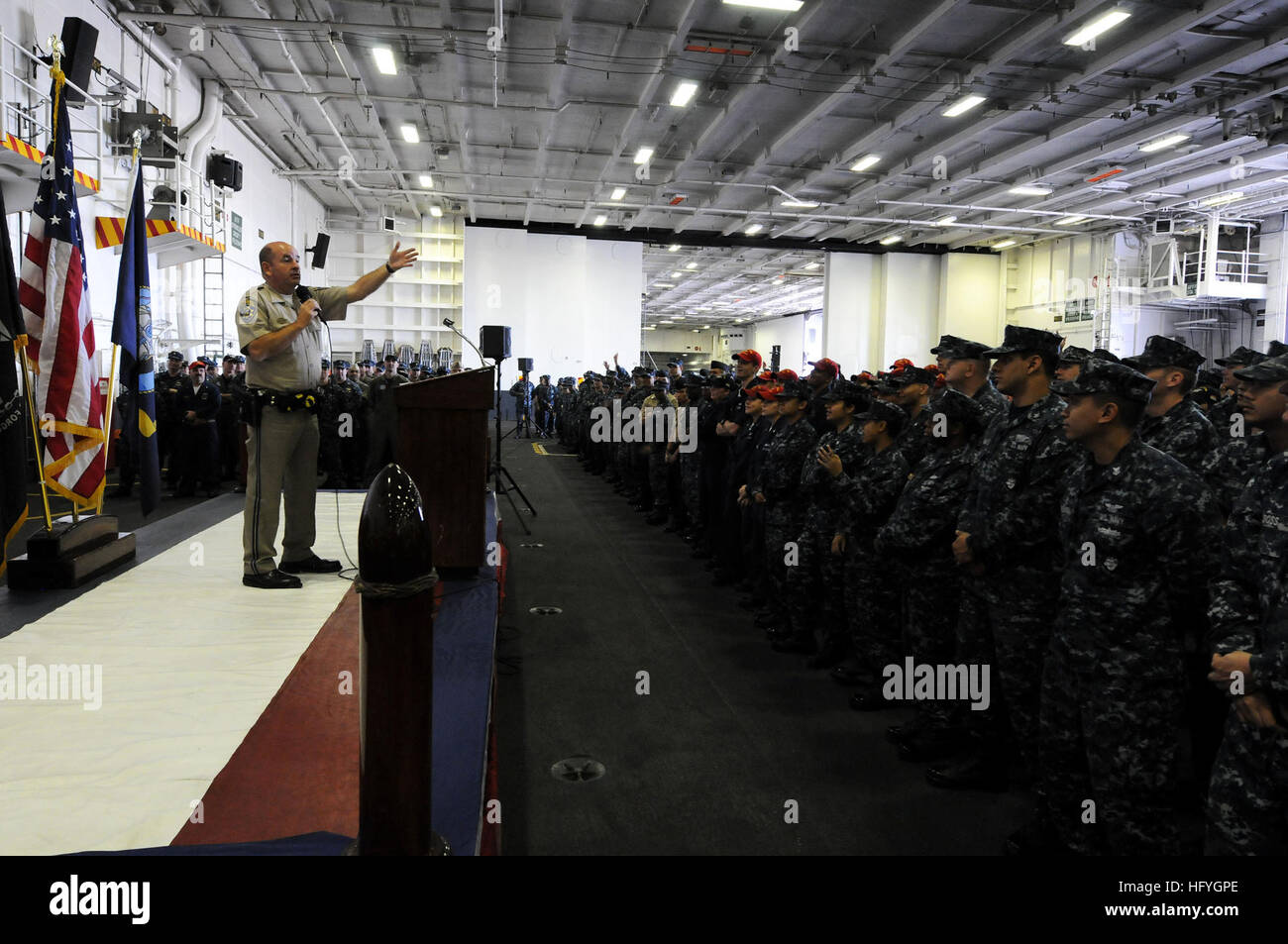 California Highway Patrol Officer Mark Gregg addresses sailors from the ...