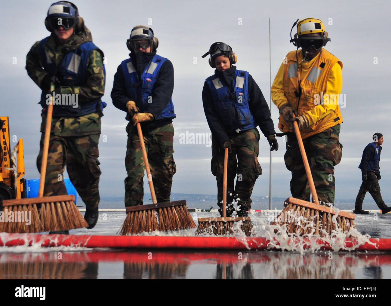 Crew members scrub deck hi-res stock photography and images - Alamy