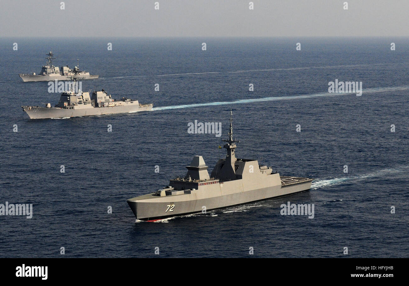 The guided-missile destroyers USS Gridley and USS Stockdale sail in ...