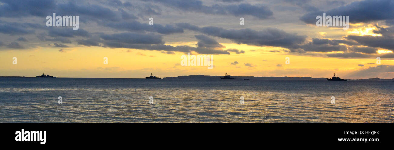 The guided-missile destroyers USS Lassen, USS Curtis Wilbur, USS Mustin ...
