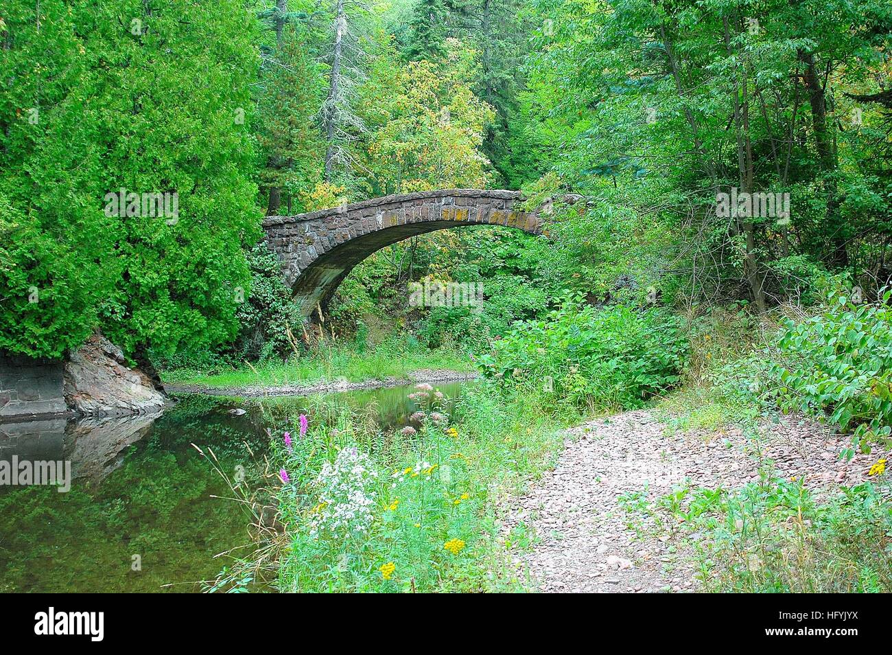 Old stone bridge over creek hi-res stock photography and images - Alamy