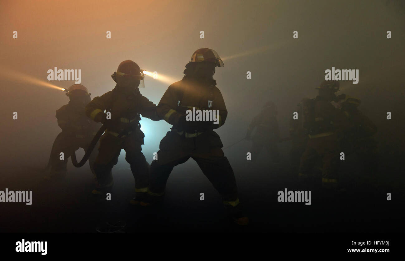Navy fire hose teams hi-res stock photography and images - Alamy