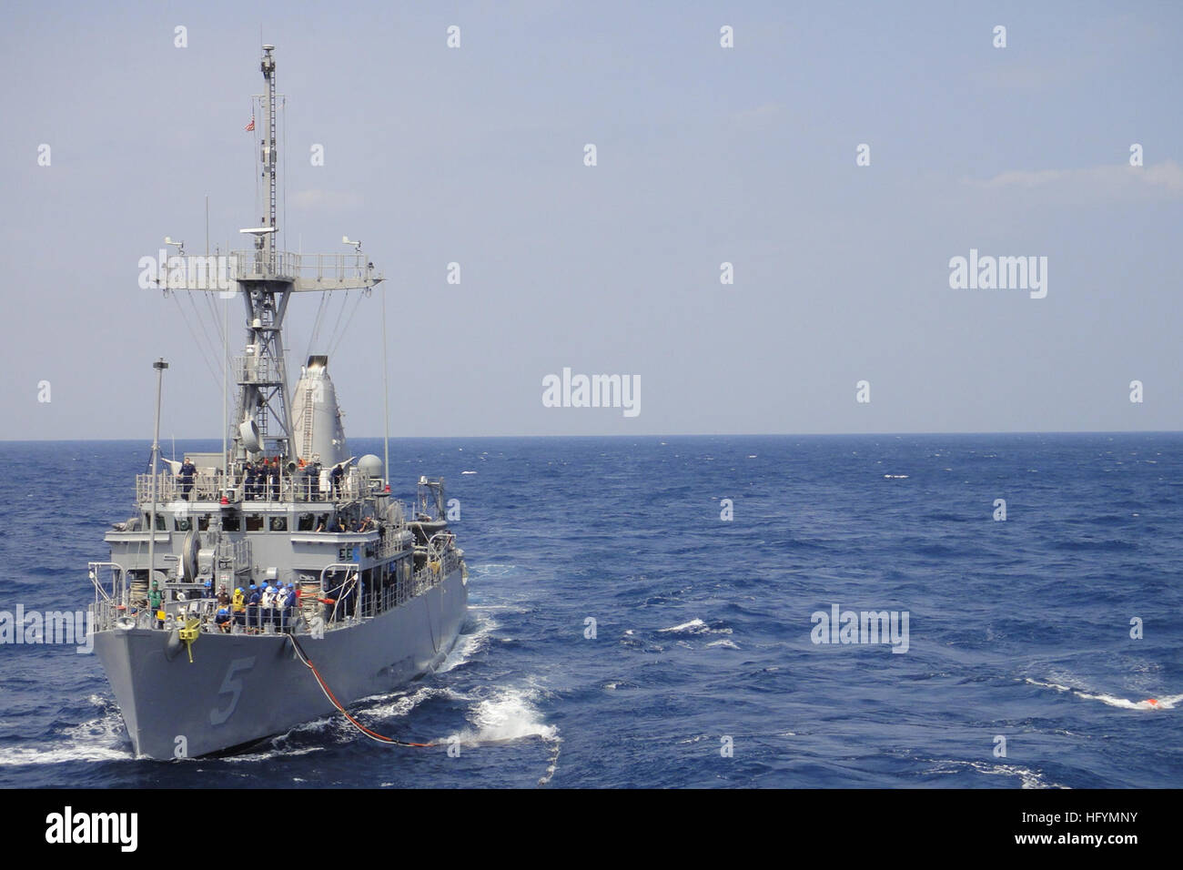 USS Guardian (MCM 5) conducts underway replenishment with USNS Matthew ...