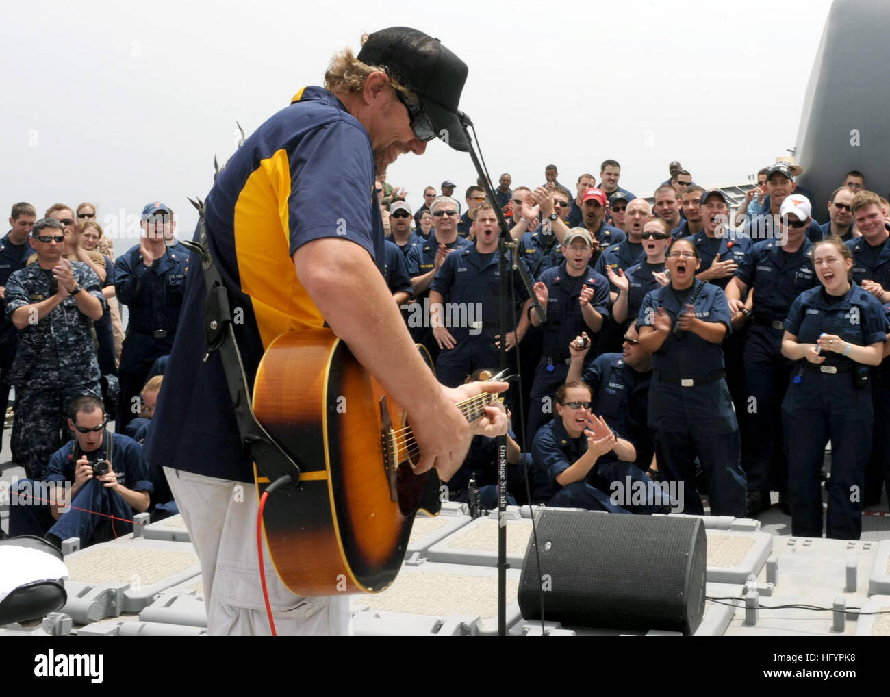 110424-N-BZ392-597 ARABIAN GULF (April 24, 2011) Country music ...