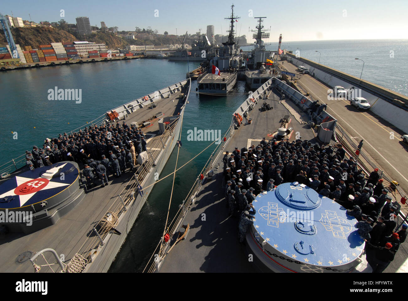 Sailors aboard guided-missile frigates USS Thach and USS Boone (FFG 28 ...