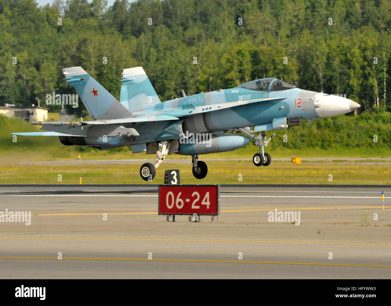 An F/A-18C Hornet from Fighter Squadron Composite 12 launches from ...