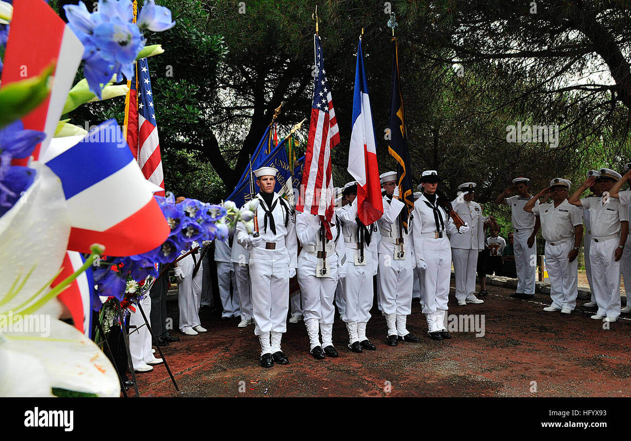 USS Whidbey Island (LSD 41) color guard stands at attention during a ...