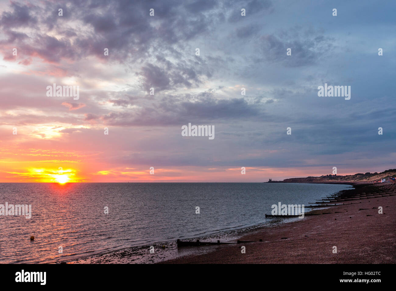 England, Herne Bay. Sunrise over the English Channel, beach with wave ...