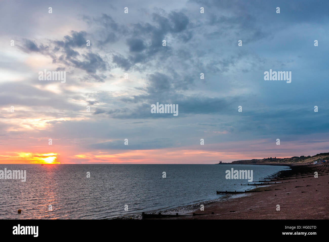 England, Herne Bay. Sunrise over the English Channel, beach with wave ...