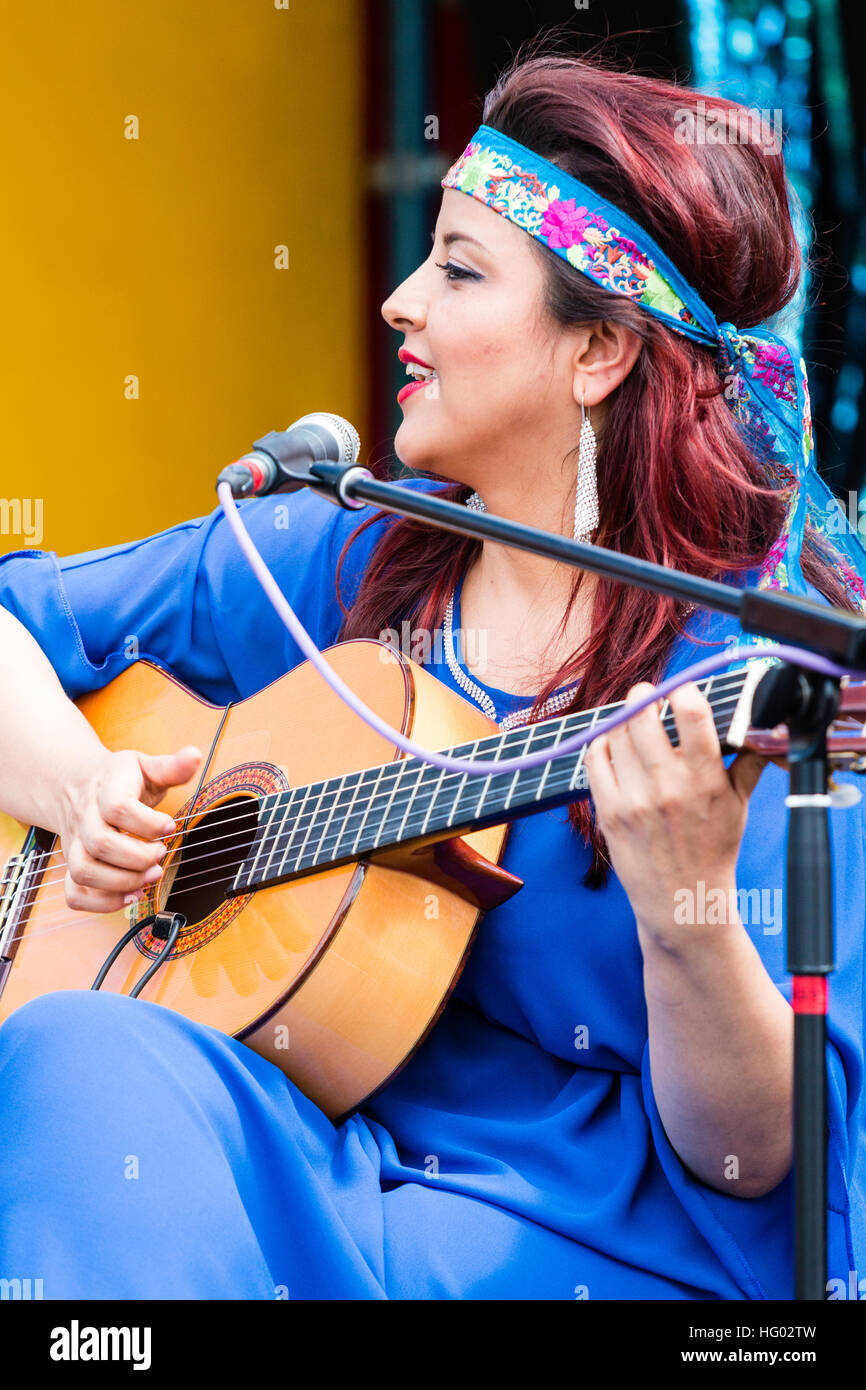 Columbian songwriter, singer and guitarist, Carolina Herrera in blue ...