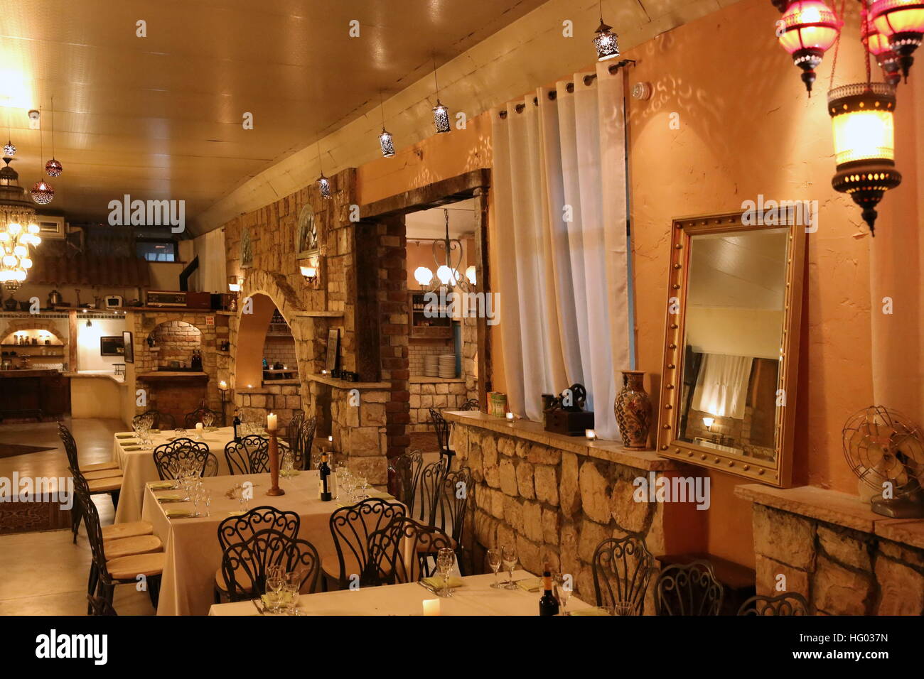 Atmospheric lit restaurant interior Stock Photo - Alamy