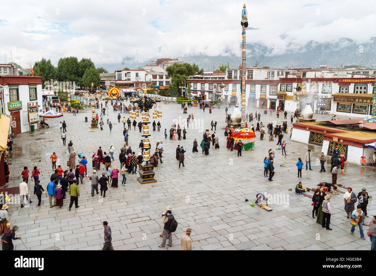 Lhasa, Tibet - The view of many Pilgrims at the Jokhang Temple Square ...