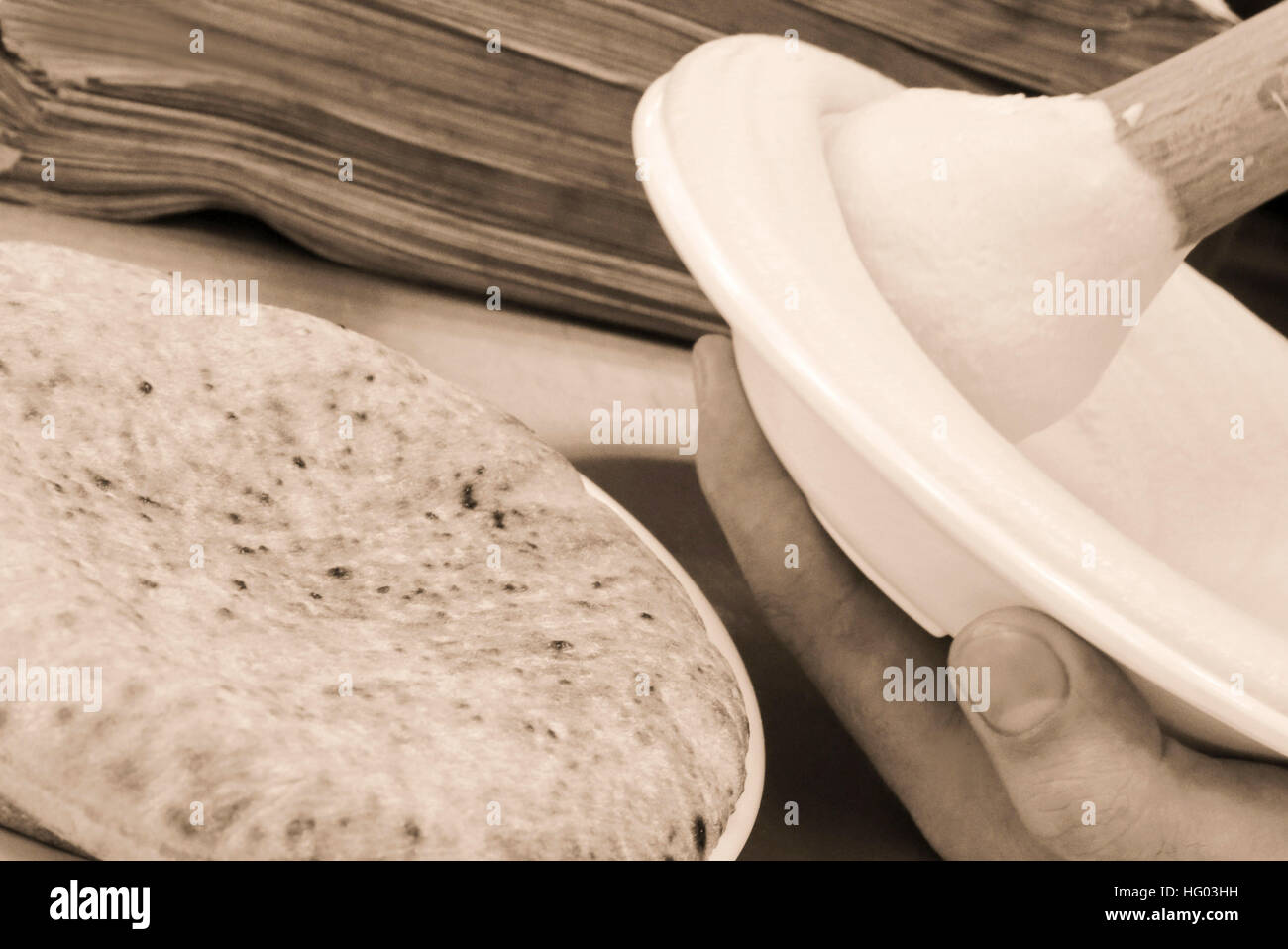 Preparing Hummus. A Levantine Arab dip or spread made from cooked ...