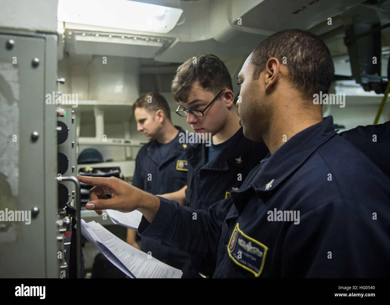Sailors aboard the guided-missile destroyer USS Stout (DDG 55) conduct ...