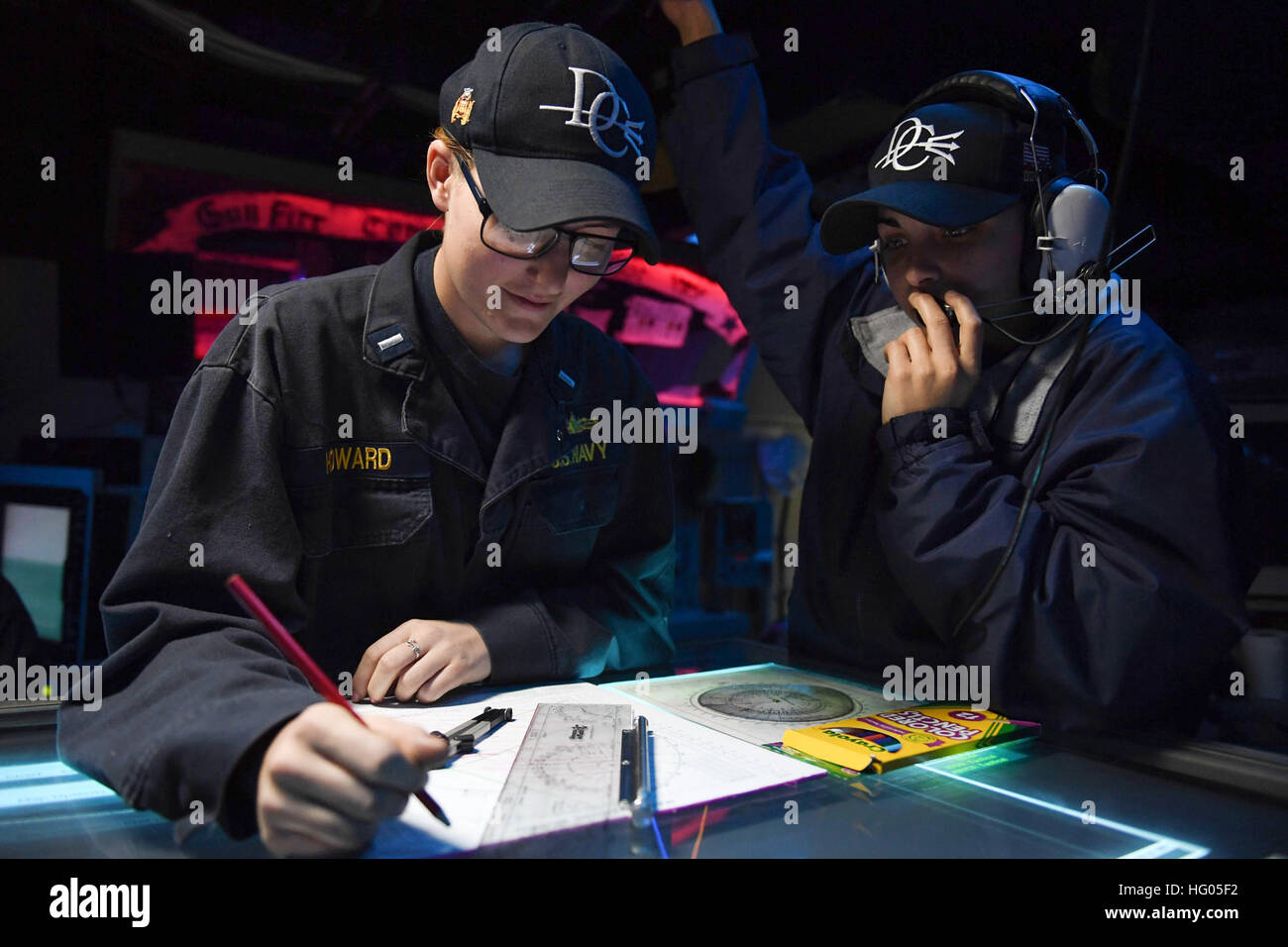 Sailors from Naval Special Warfare Logistics Support Unit 1 distribute ...