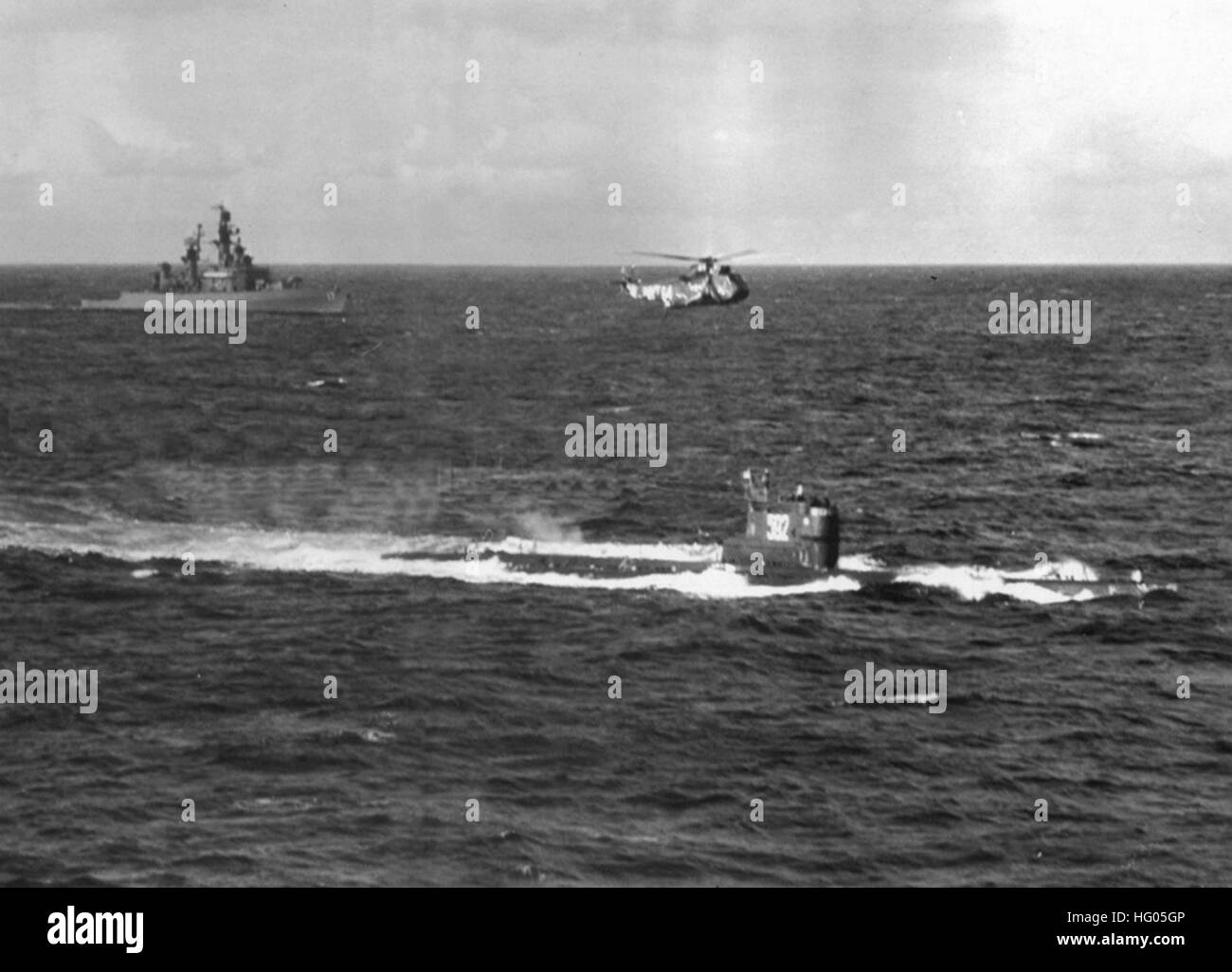 USS Harry E. Yarnell (DLG-17) and a SH-3A Sea King escort a Soviet ...