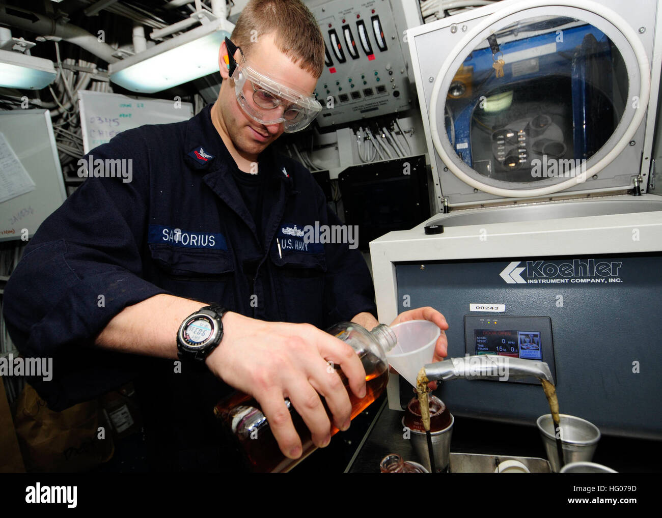 Petty Officer 2nd Class Kevin J. Satorius, machinist's mate, conducts a ...