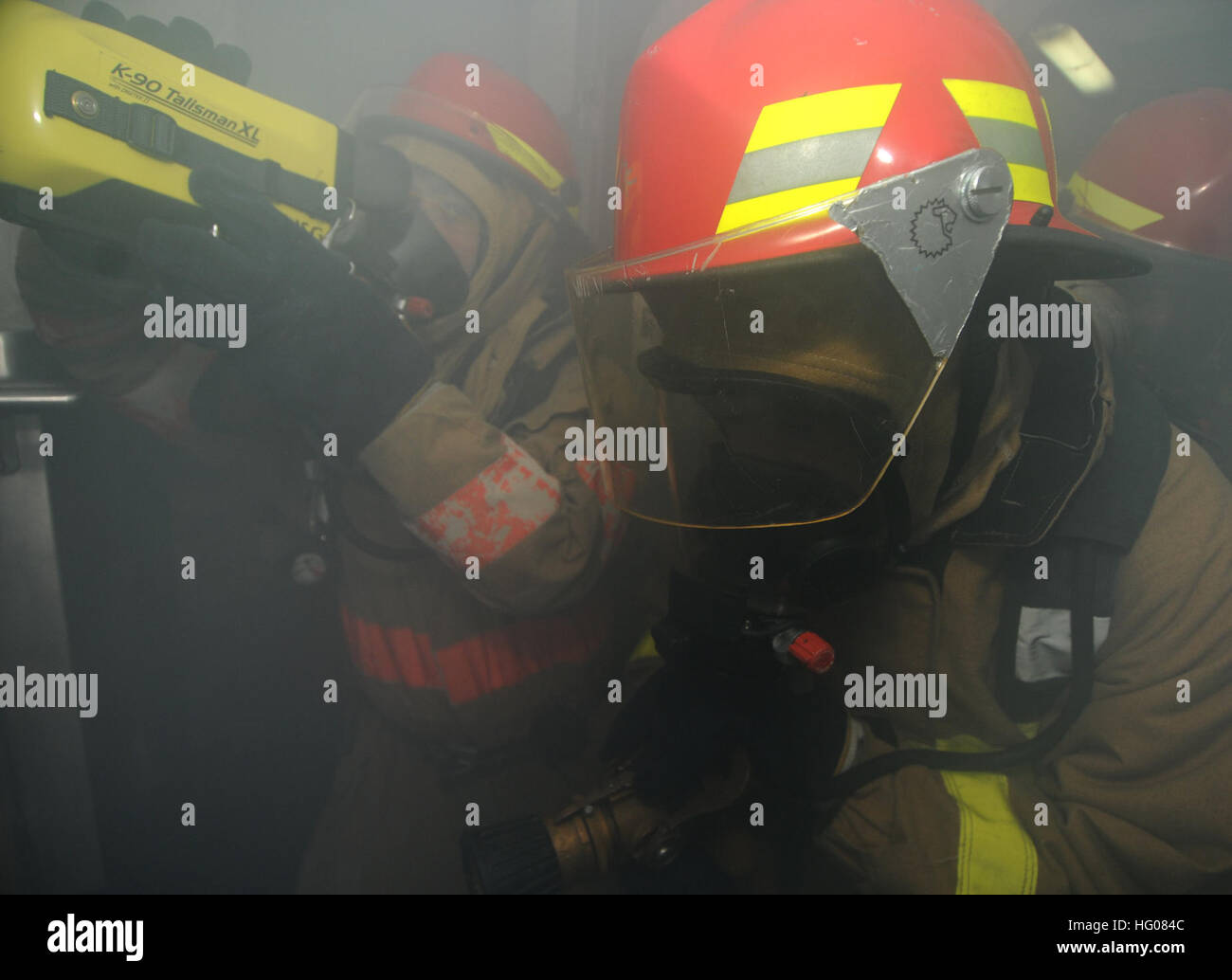 111215-N-KA046-227 Gulf of Oman (Dec. 15, 2011) A firefighting team ...