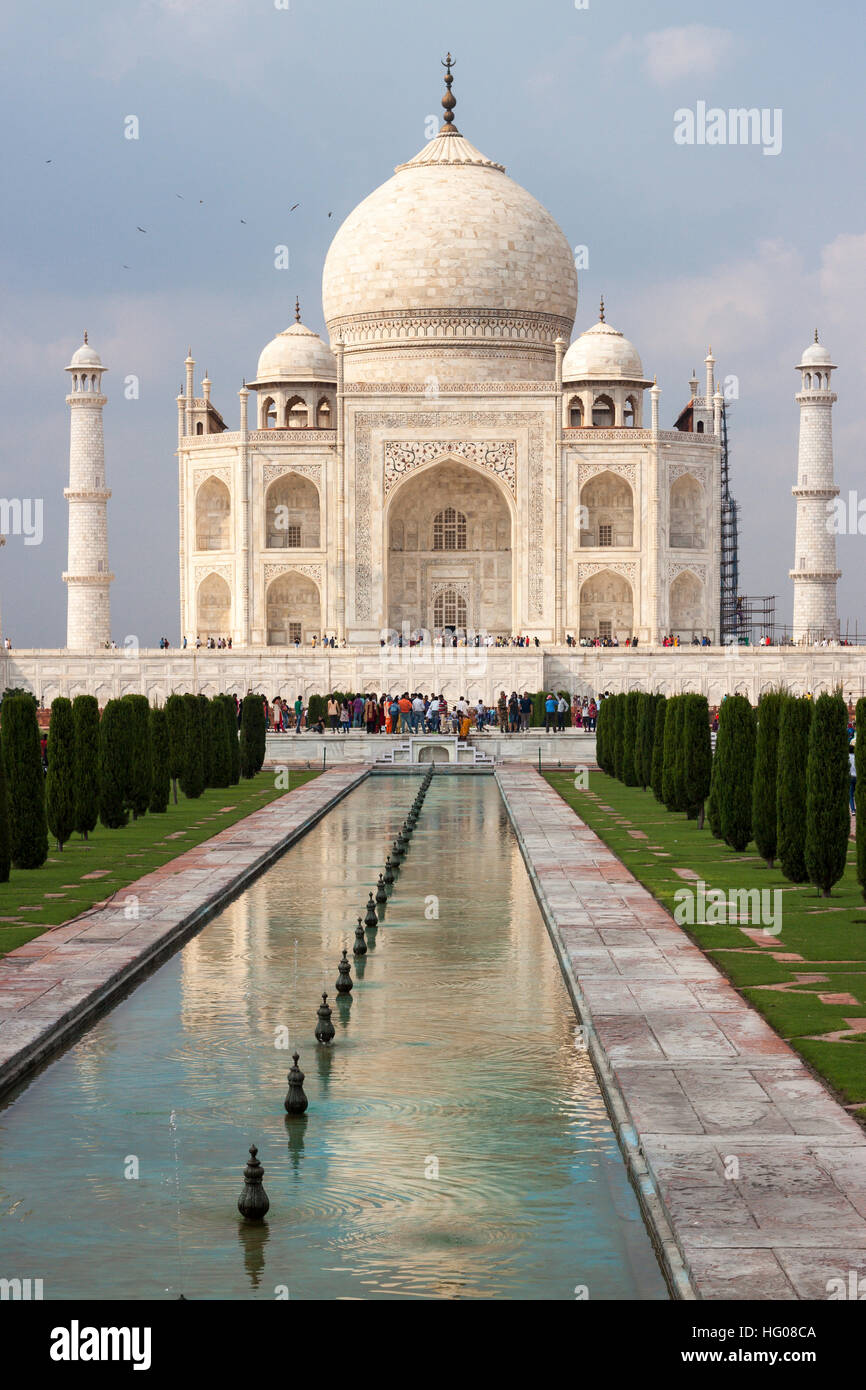The reflex of Taj Mahal in the water in a hot summer afternoon. Agra ...