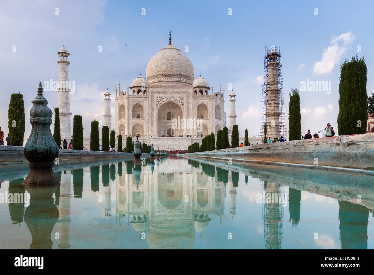 The reflex of Taj Mahal in the water in a hot summer afternoon. Agra ...