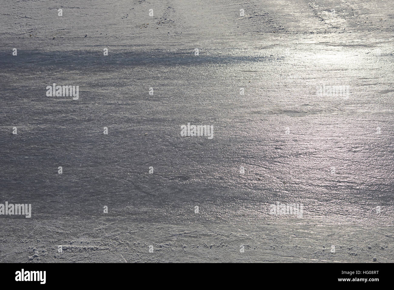 ice background with marks from skating and hockey, Ice rink floor ...