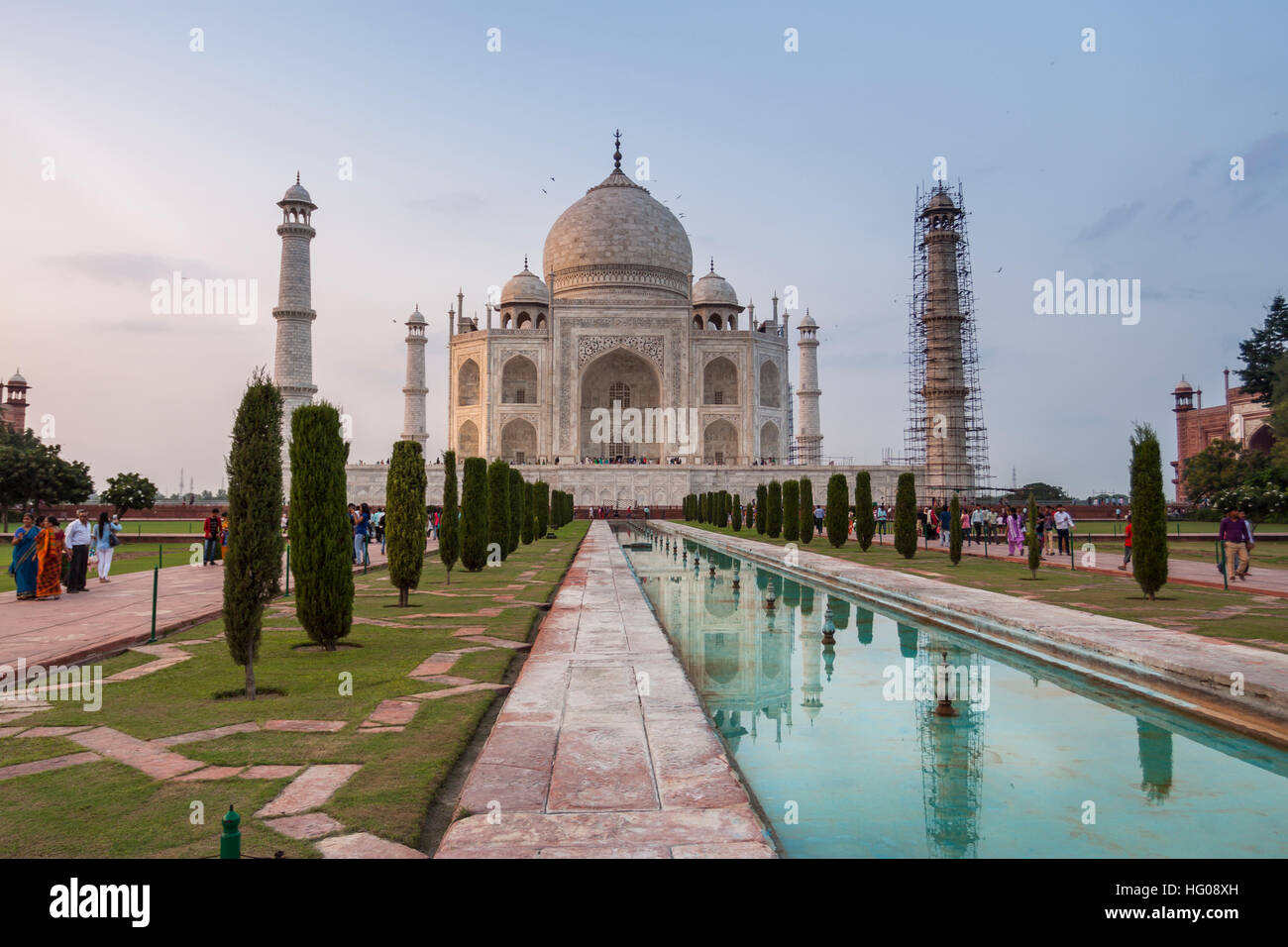 The reflex of Taj Mahal in the water in a hot summer afternoon. Agra ...