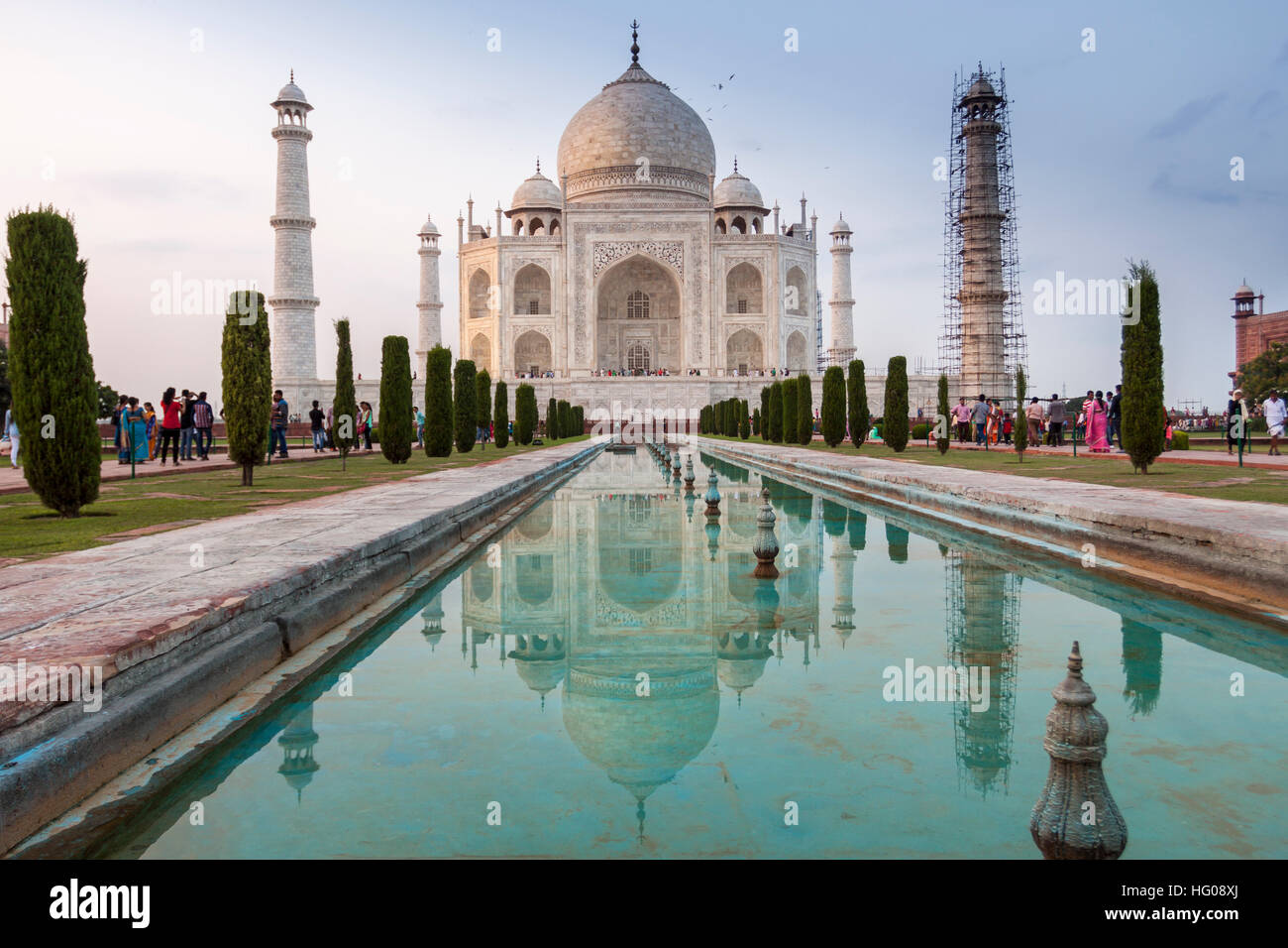 The reflex of Taj Mahal in the water in a hot summer afternoon. Agra ...