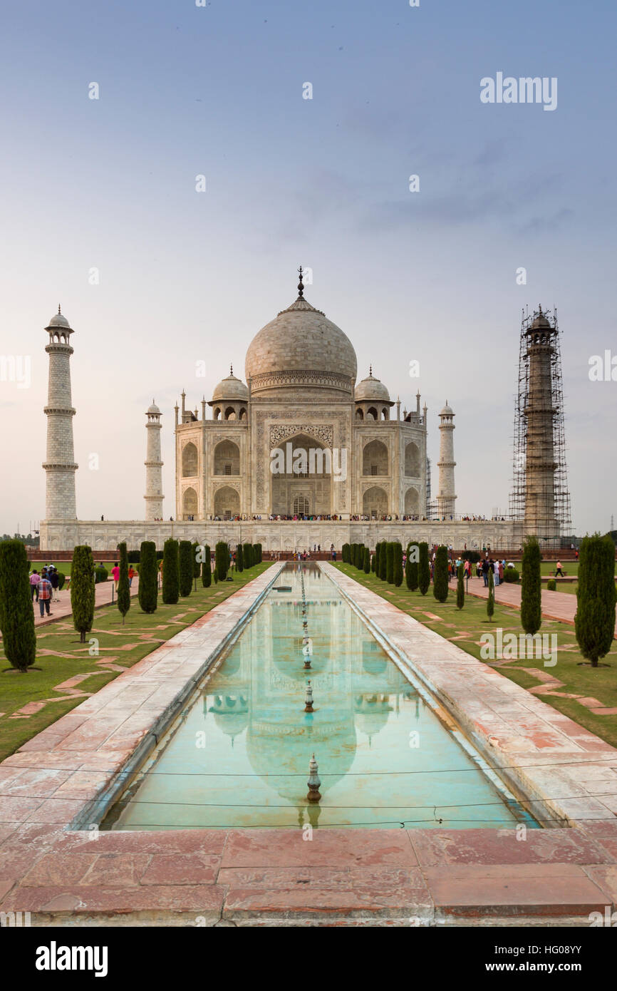 The reflex of Taj Mahal in the water in a hot summer afternoon. Agra ...