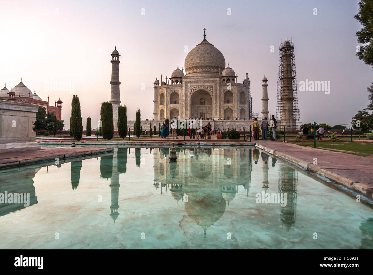 The reflex of Taj Mahal in the water in a hot summer afternoon. Agra ...