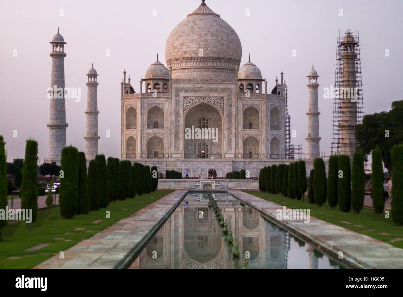 The reflex of Taj Mahal in the water in a hot summer afternoon. Agra ...