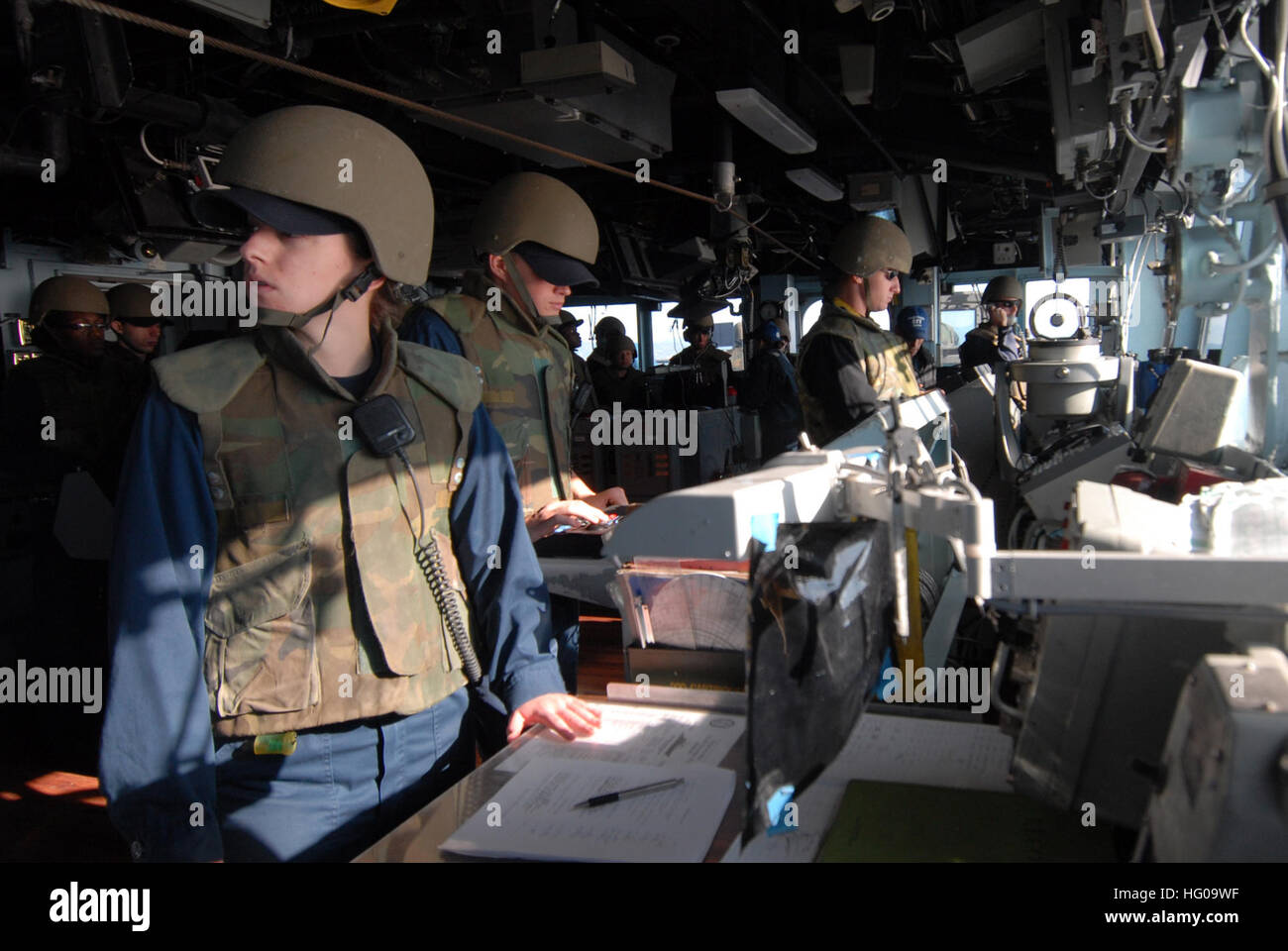 111128-N-DU438-210 MEDITERRANEAN SEA (Nov. 28, 2011) Officers stand ...