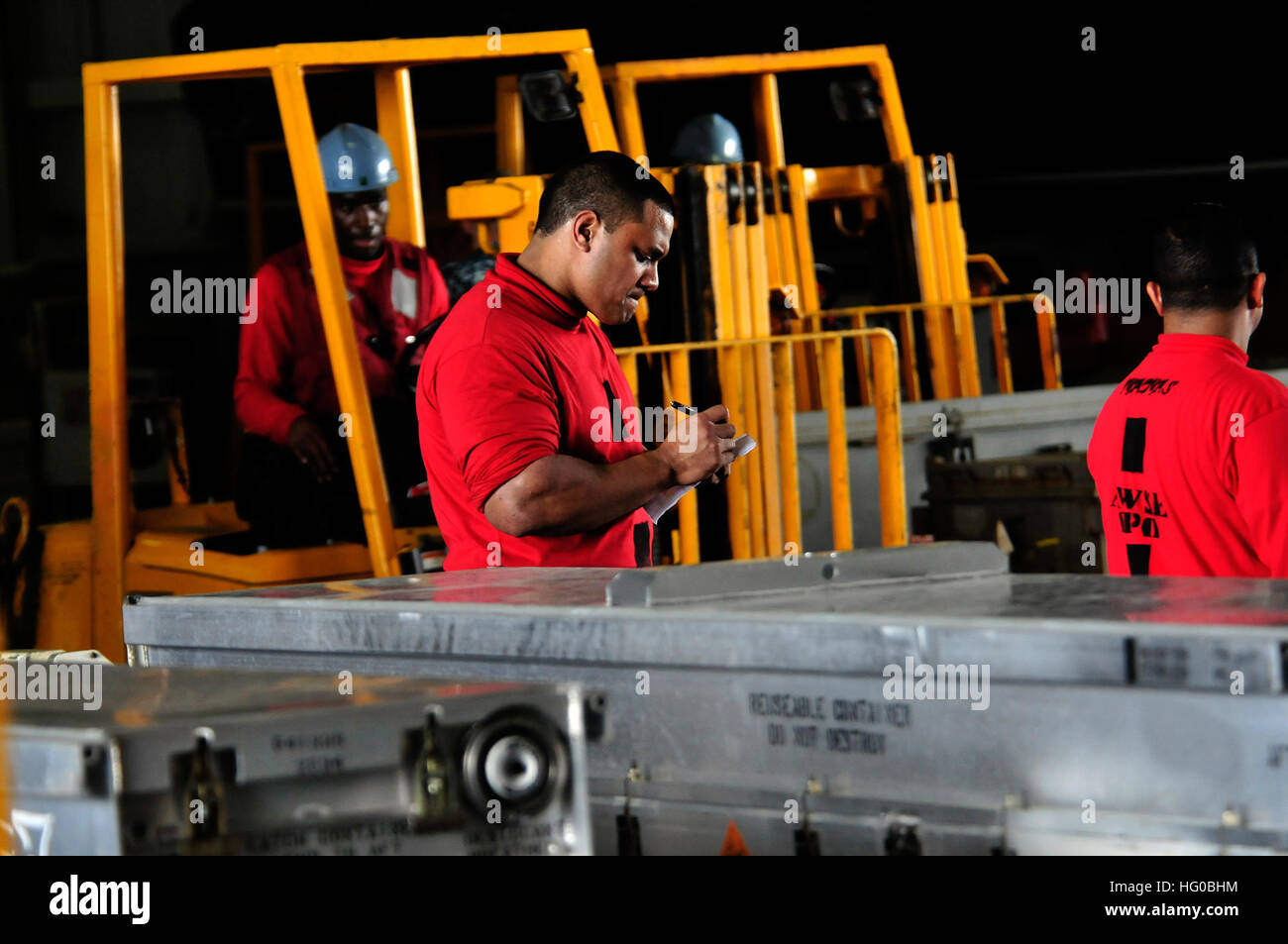 An Aviation Ordnanceman aboard USS Carl Vinson records ordnance ...