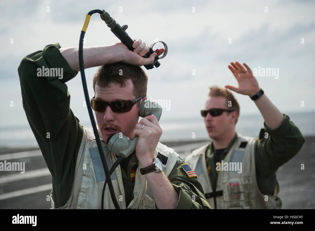 120105-N-DR144-010 INDIAN OCEAN (Jan. 5, 2012) Landing Signal Officer ...