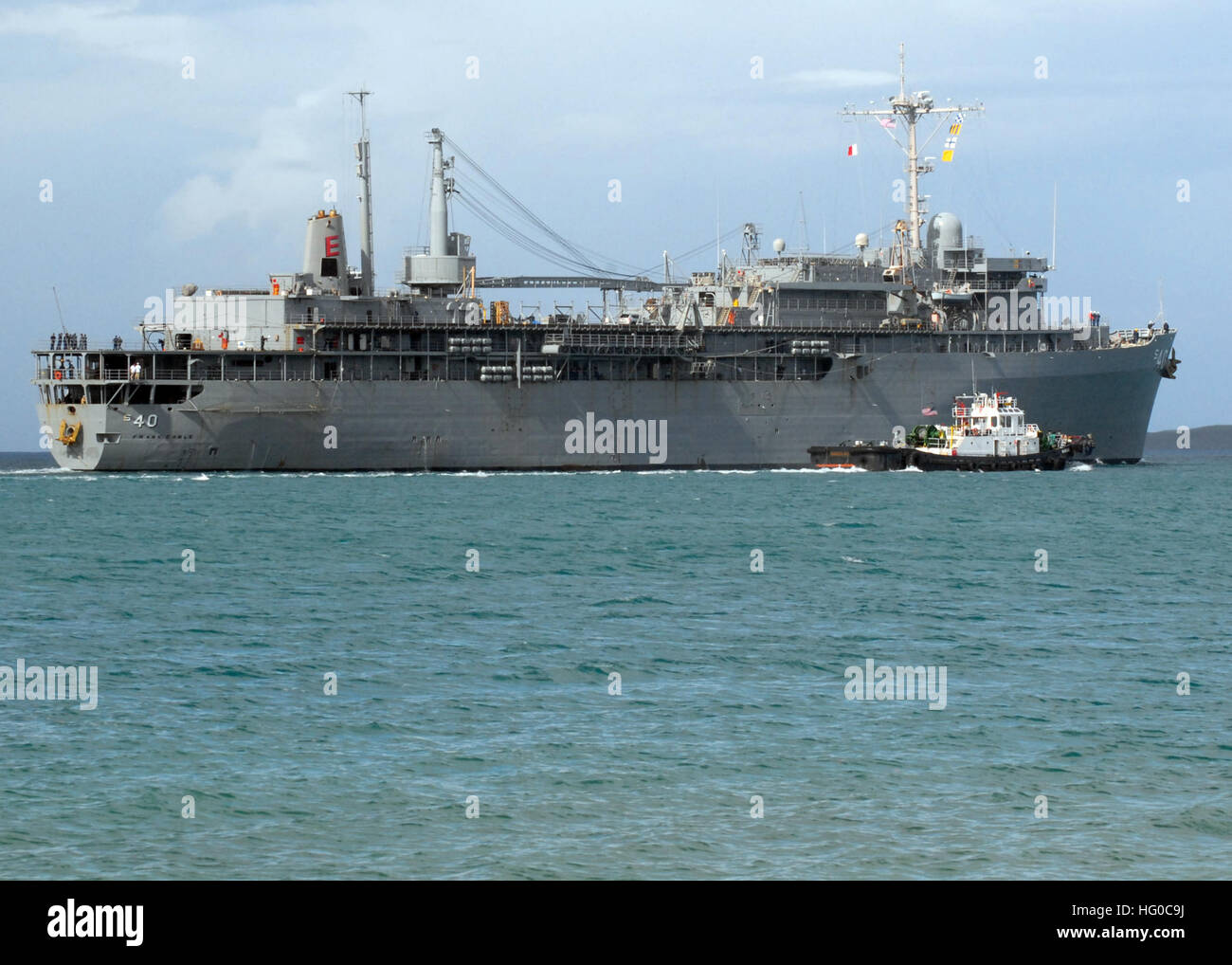 The submarine tender USS Frank Cable (AS 40) transits Apra Harbor en ...