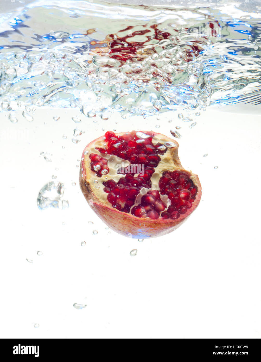 Garnet in the water on a white background Stock Photo - Alamy