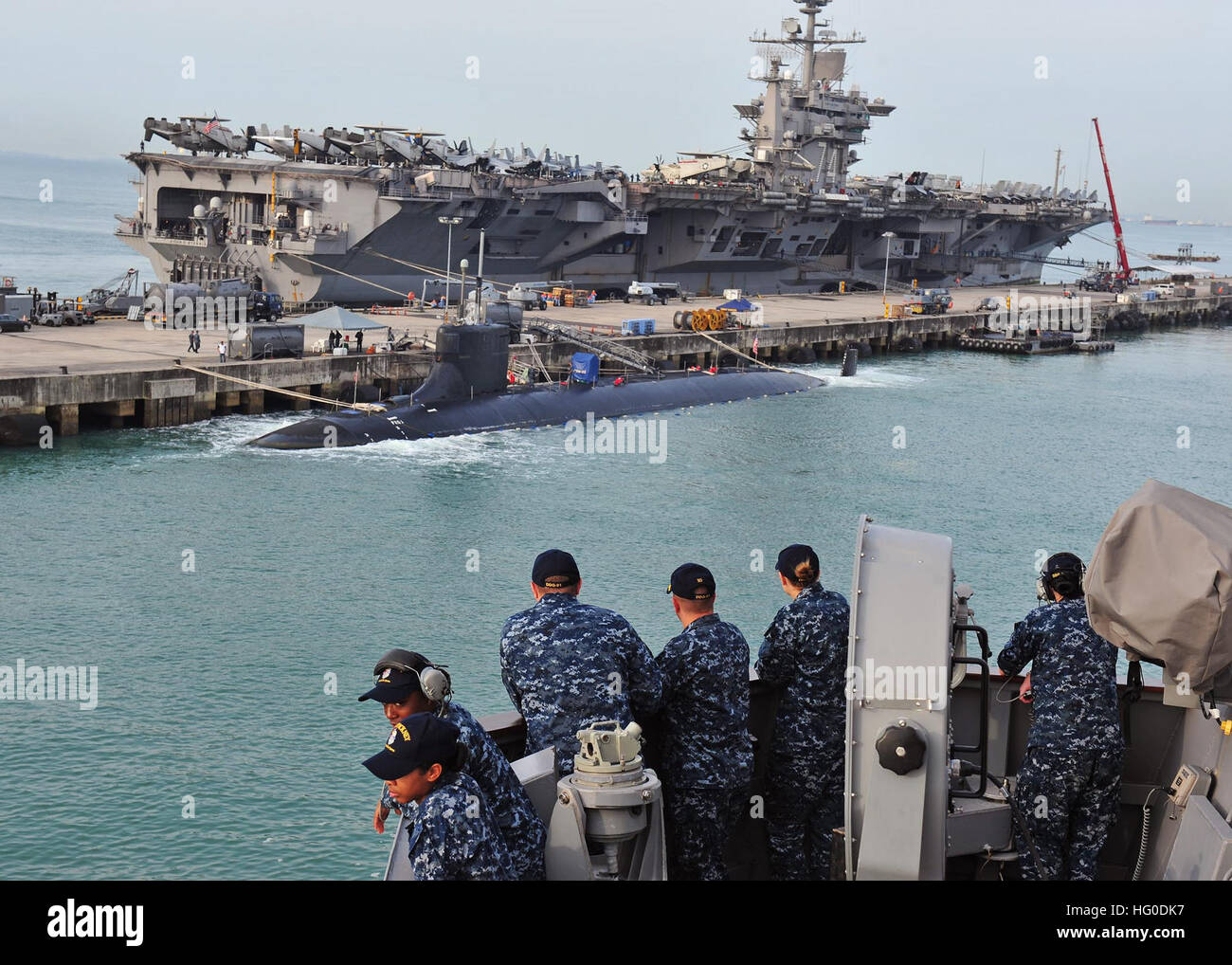 120130-N-ED900-235 SINGAPORE (Jan. 30, 2012) Cmdr. Benjamin Nicholson ...