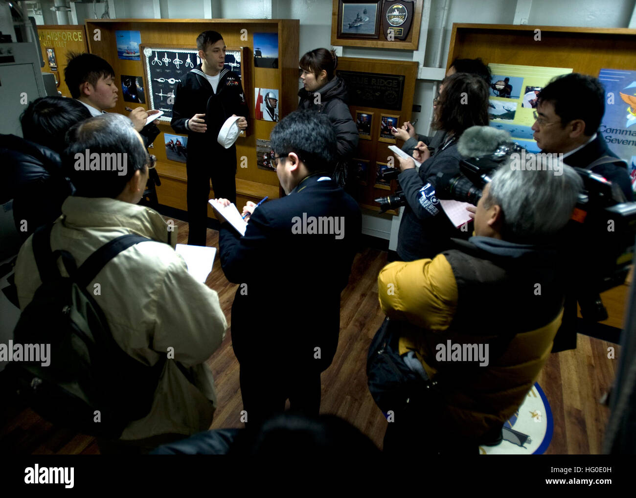 Mass Communication Specialist 3rd Class Brian Stone gives a speech to ...
