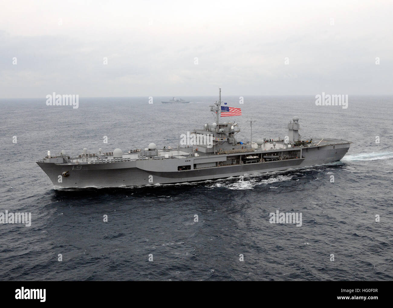 The U.S. 7th Fleet flagship USS Blue Ridge (LCC 19) prepares to pull ...