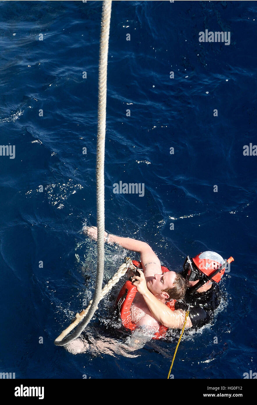 Boatswain's Mate 2nd Class Steven Wagner, a search and rescue swimmer ...
