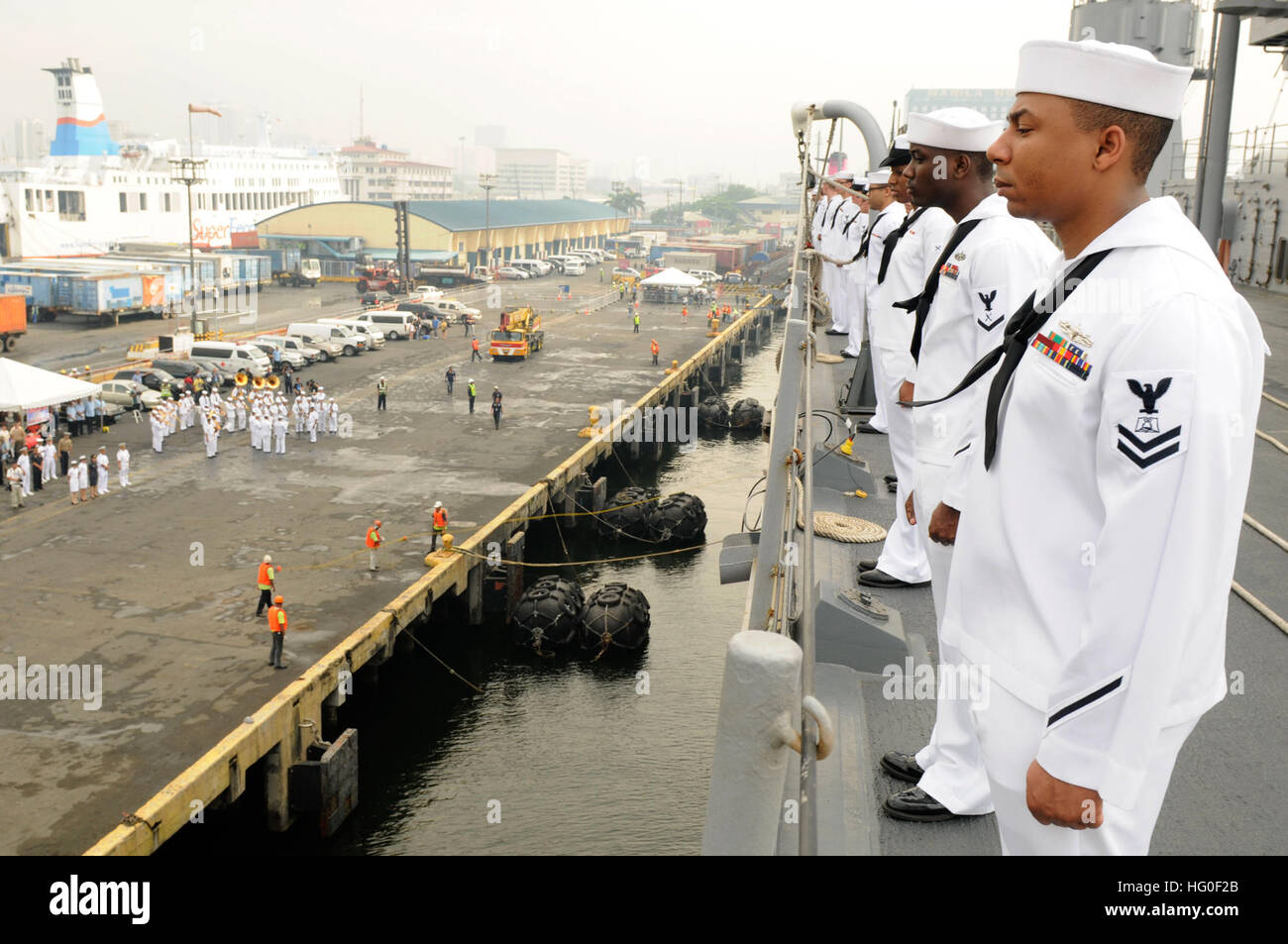 U.S. 7th Fleet flagship USS Blue Ridge (LCC 19) sailors man the rails ...