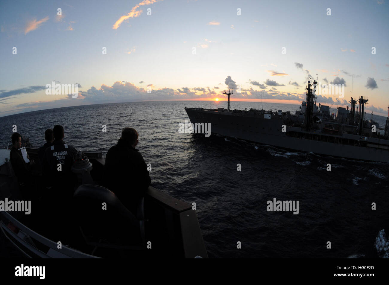 Cmdr. James Storm, right, commanding officer of the guided-missile ...
