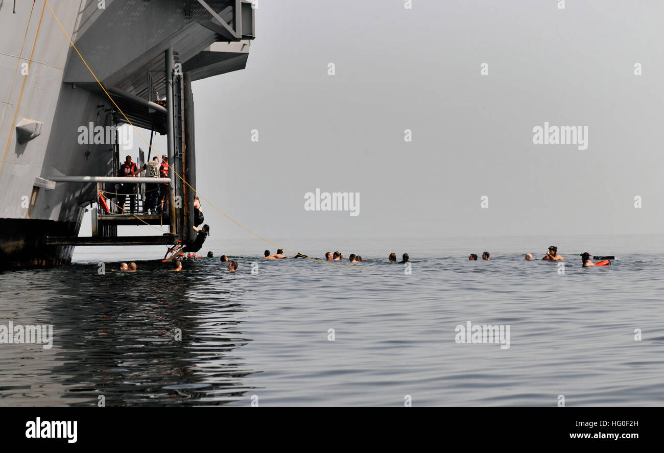 Sailors assigned the Nimitz-class aircraft carrier USS Carl Vinson (CVN ...