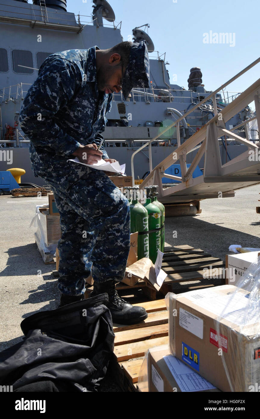 Logistics Specialist Seaman Earl E. Smith, assigned to the Arleigh ...