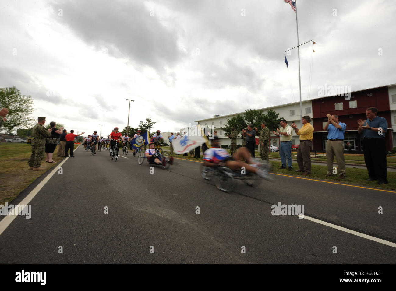 Sailors and civilians with Navy Expeditionary Combat Command show their ...