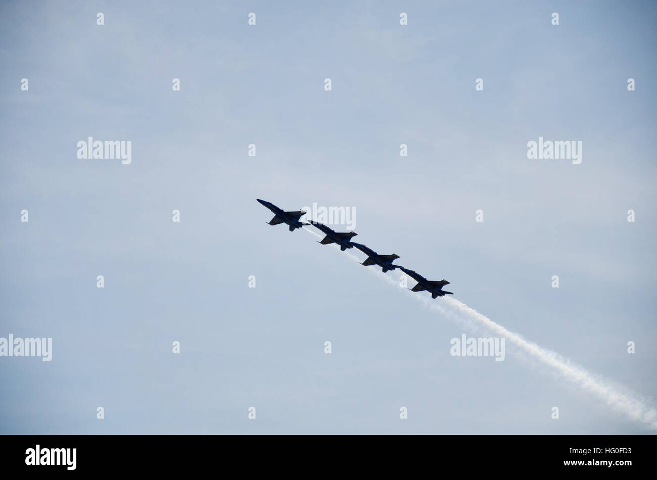 Four F/A-18 Hornet Blue Angels flight demonstration aircraft fly in ...