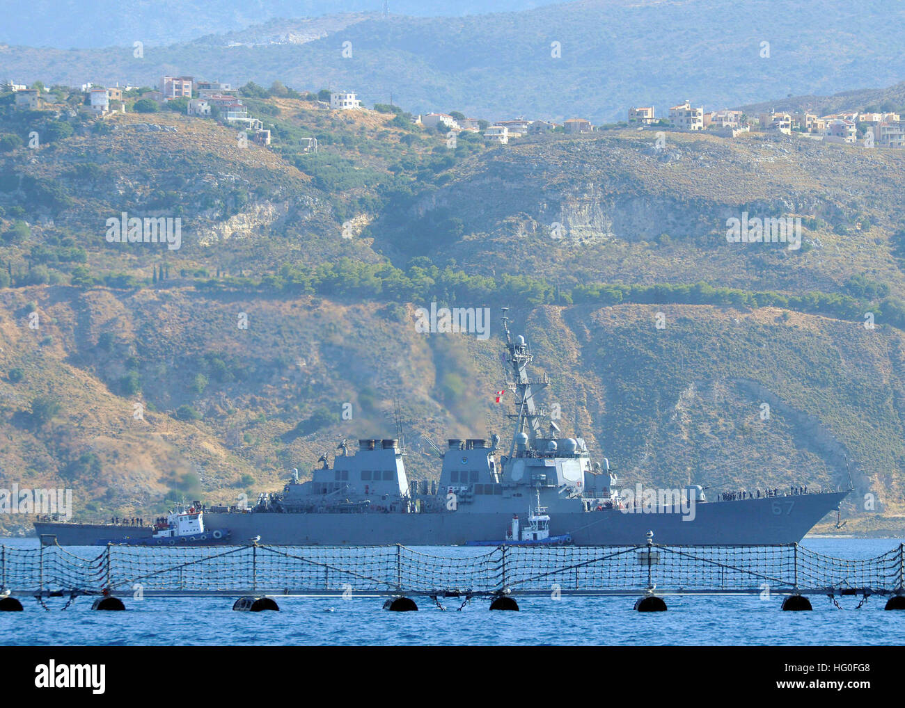The guided missile destroyer USS Cole (DDG 67) arrives for a scheduled ...
