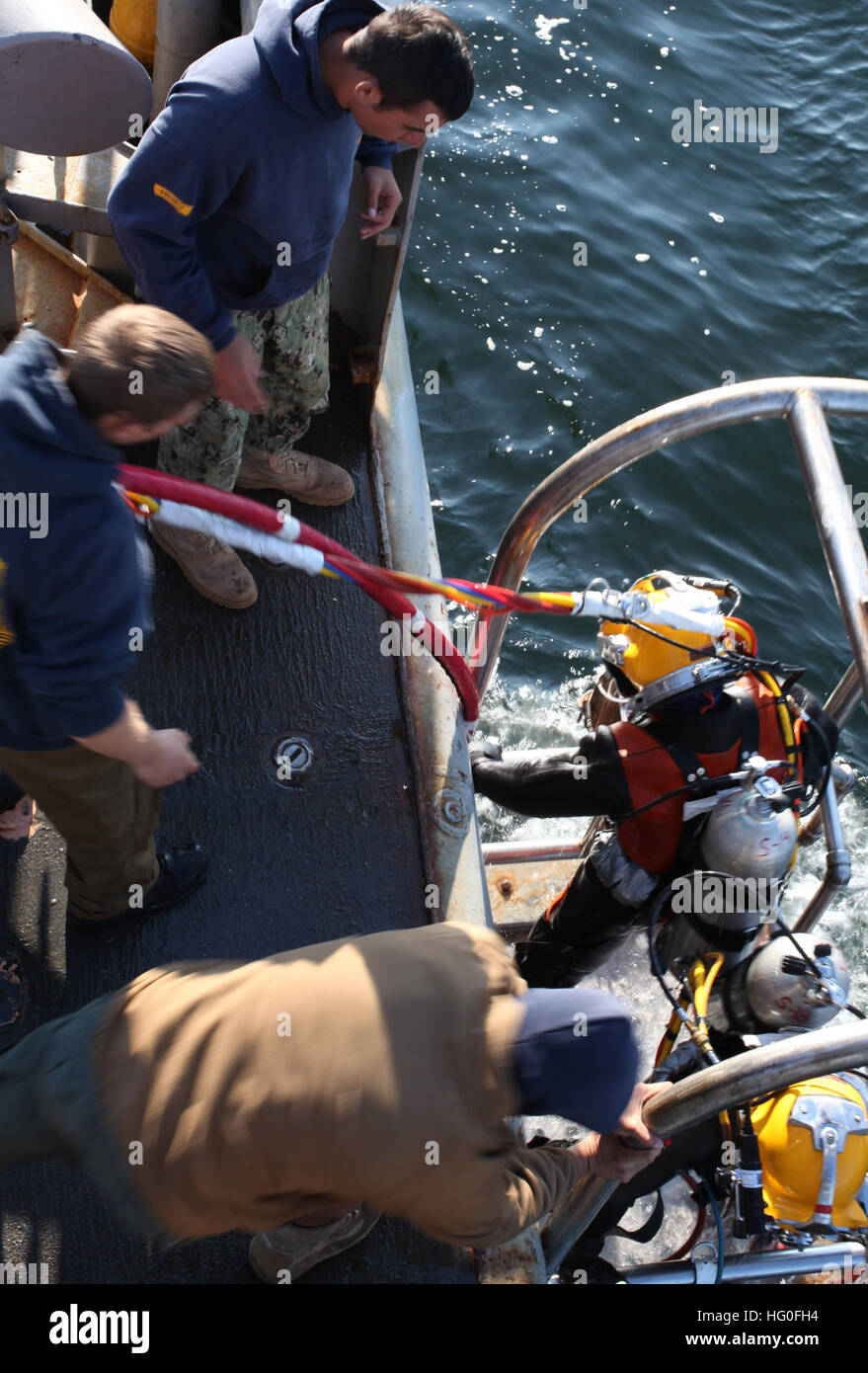 Divers, assigned to Mobile Diving and Salvage Unit 2, and the Joint POW ...