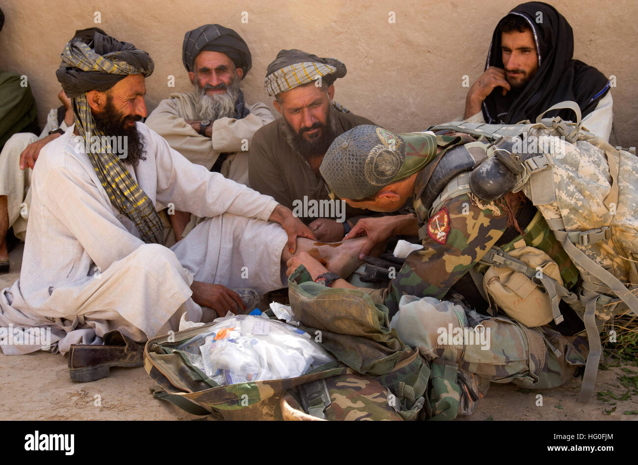 An Afghan National Army commando from the 3rd Special Operations Kandak ...