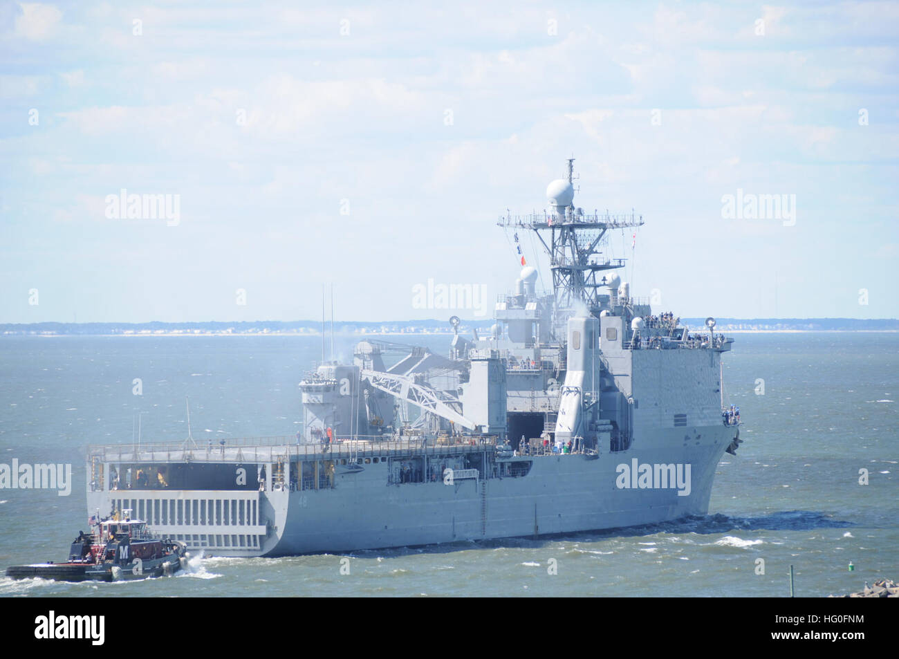 The amphibious dock landing ship USS Ashland (LSD-48) gets under way ...
